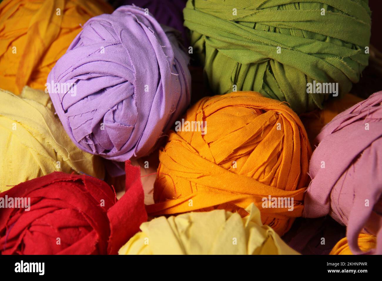 Colorful balls with cut rags for rag rug weaving Stock Photo - Alamy