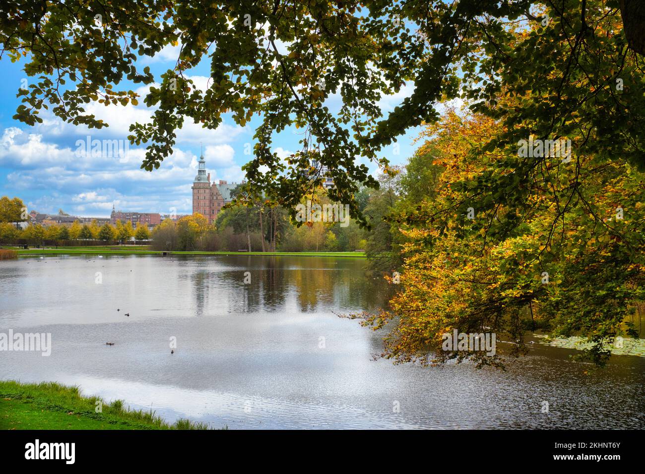 Frederiksborg castle park with created lake, in the background the ...