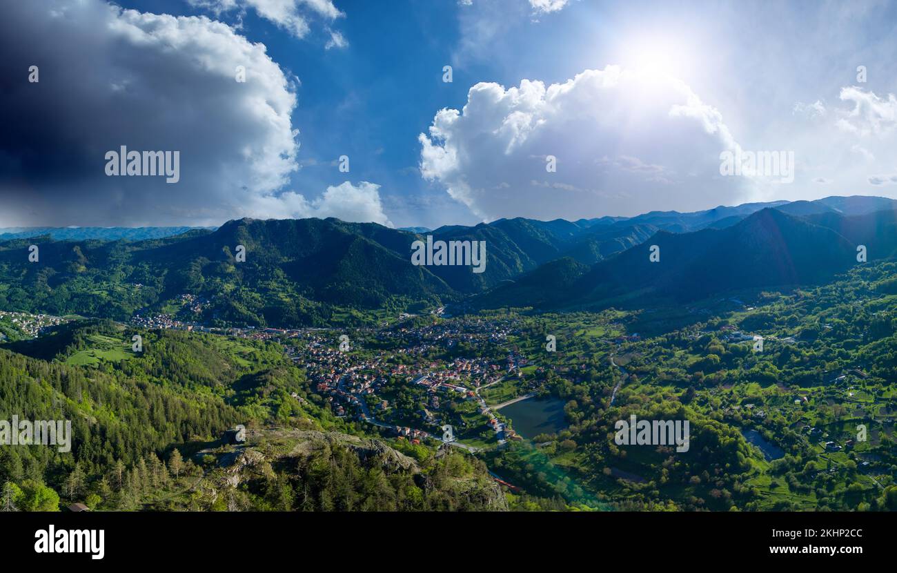 Bulgarian town Smolyan with lake, vegetation and clouds. Rhodope ...