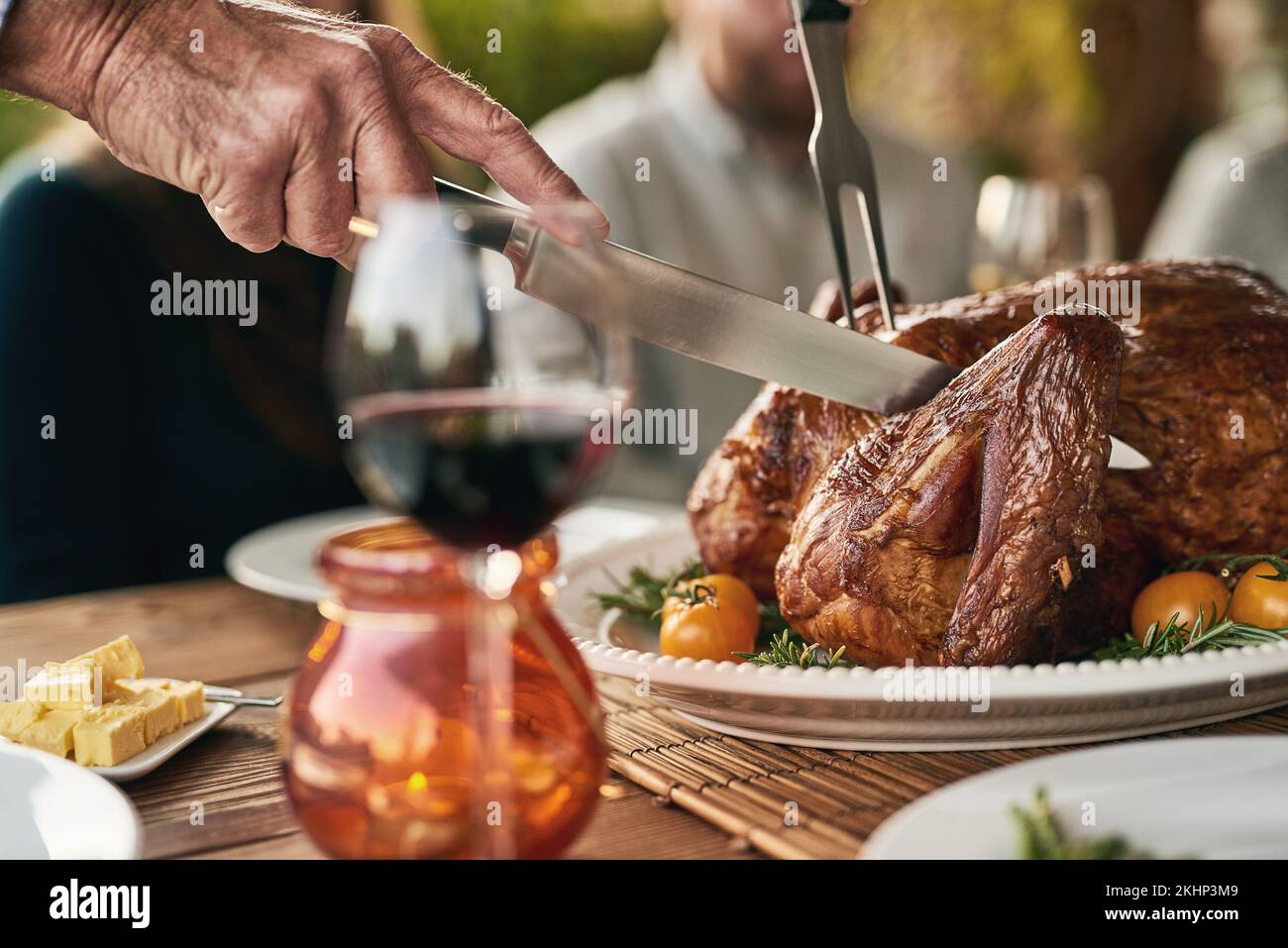 Hands, food and man with turkey on thanksgiving, lunch and meal at ...