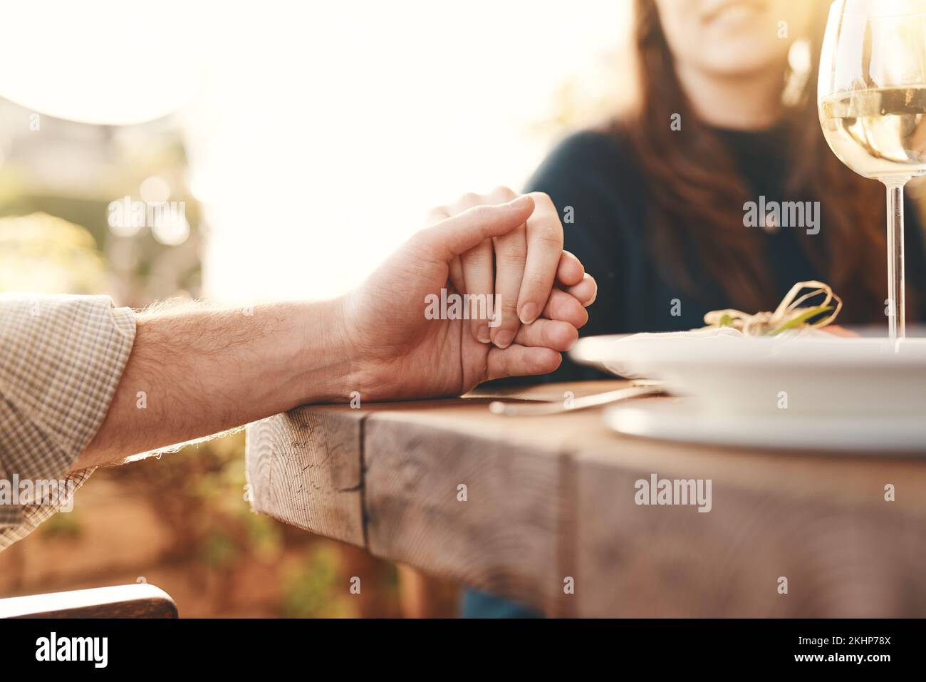 Worship, table and people holding hands to pray for the meal, feast or ...