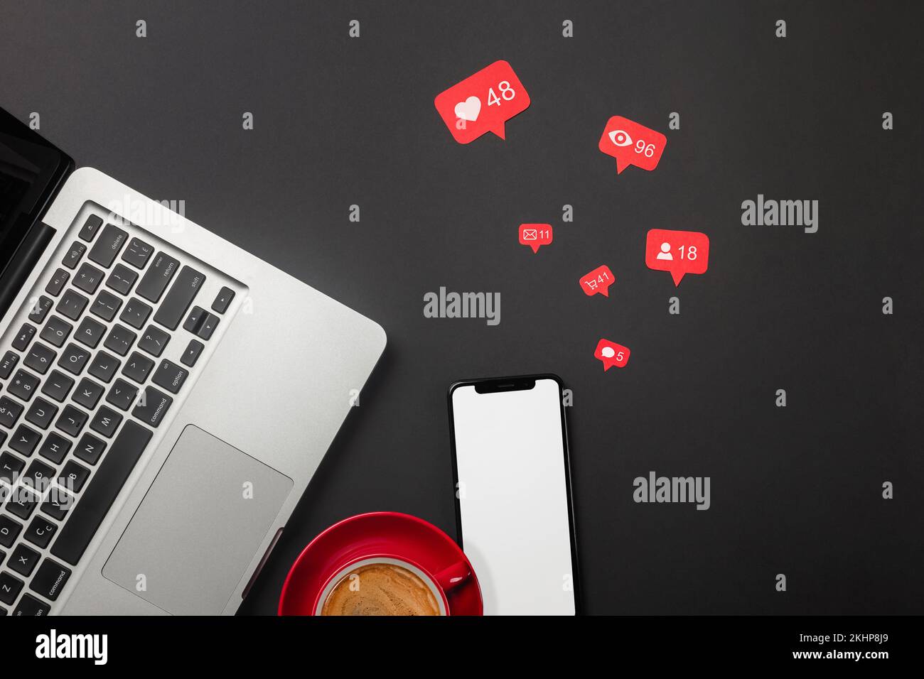 Laptop, smartphone, coffee cup and comment boards with space for your ...