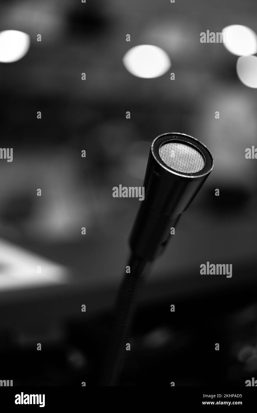A vertical grayscale of a microphone Stock Photo - Alamy