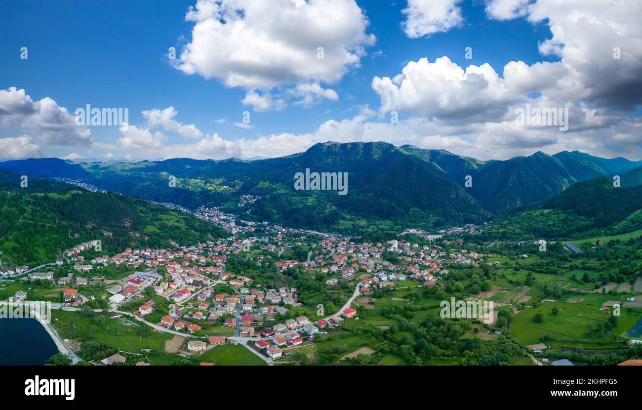 Bulgarian town Smolyan with lake, vegetation and clouds. Rhodope ...