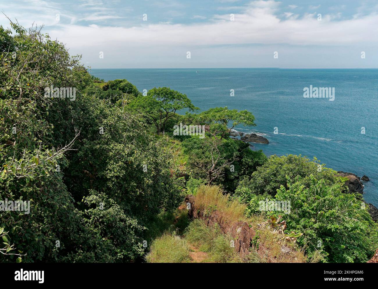 View of a Arabian Sea and rocky sea shore at Cabo de Rama in Goa India ...