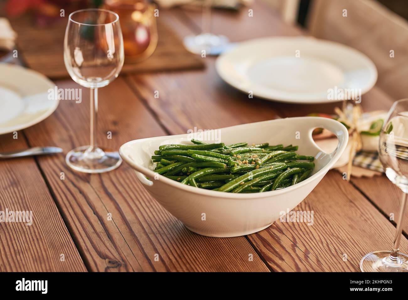 Table, vegetables and food for dinner, lunch and celebration in home ...