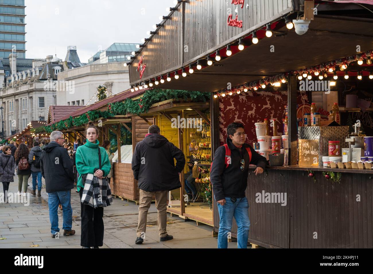 People out and about at the outdoor Christmas market in Trafalgar ...