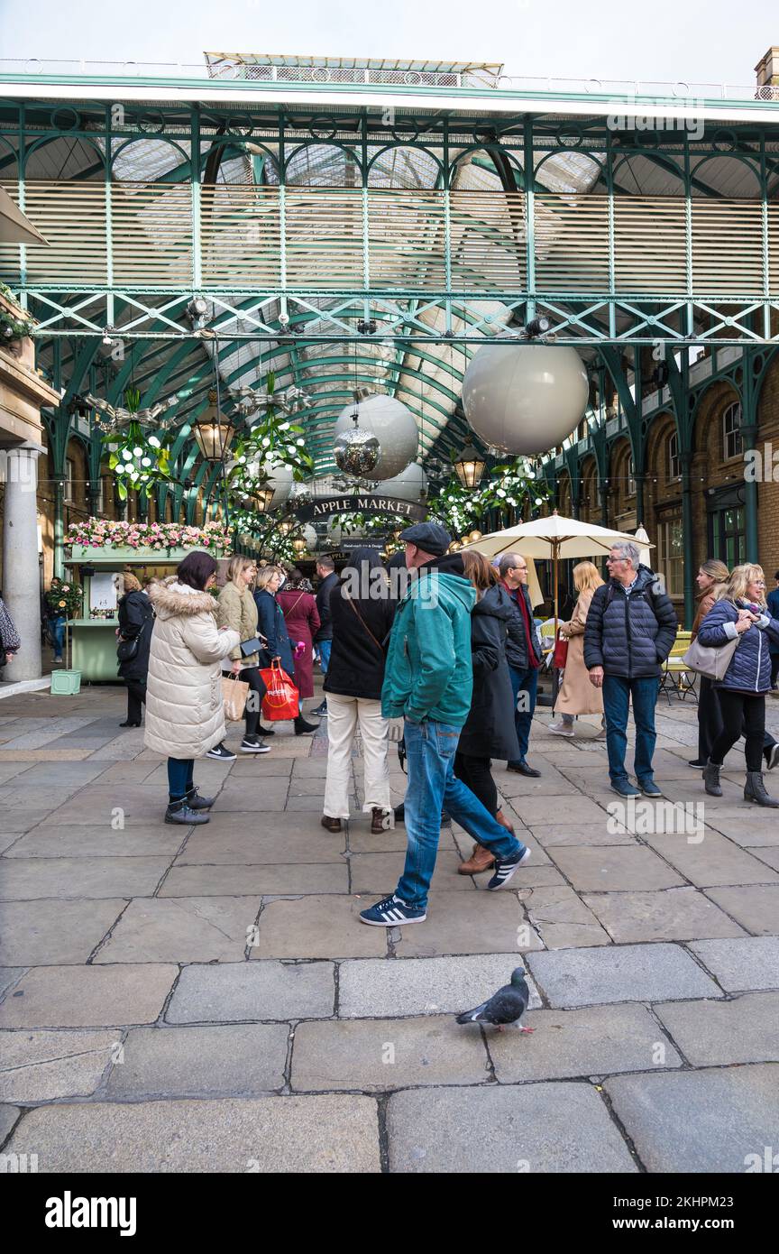 People out and about and shopping in the Apple Market. Christmas ...