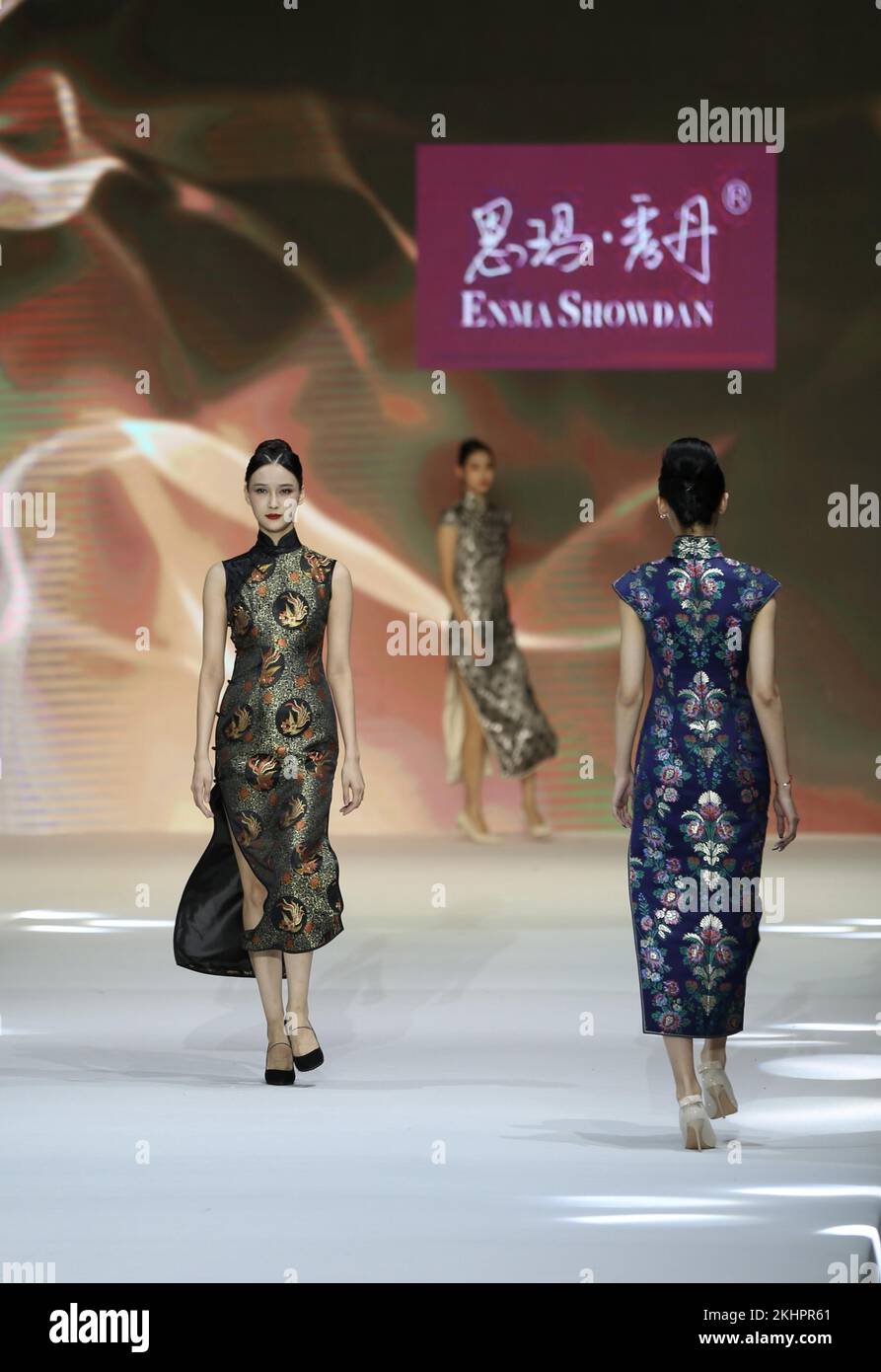 Models wearing cheongsam displayed on the catwalk at the Closing ...