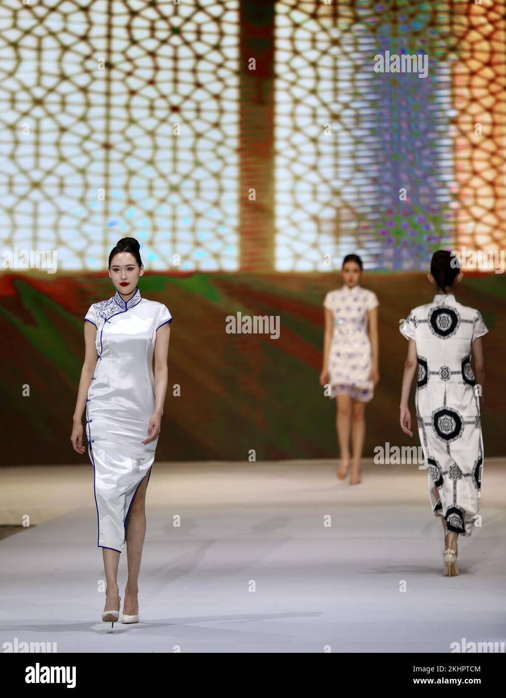 Models wearing cheongsam displayed on the catwalk at the Closing ...