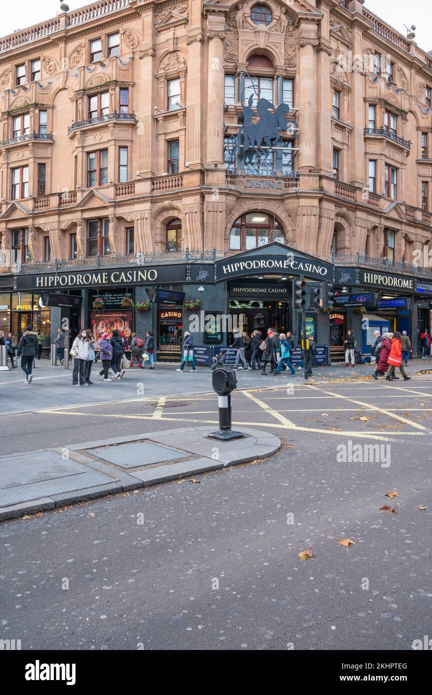 People out and about pass by The Hippodrome Casino, a 24/7 casino on ...
