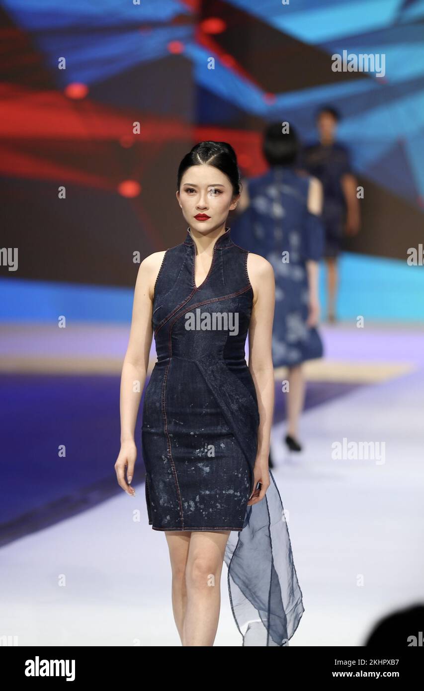 Models wearing cheongsam displayed on the catwalk at the Closing ...