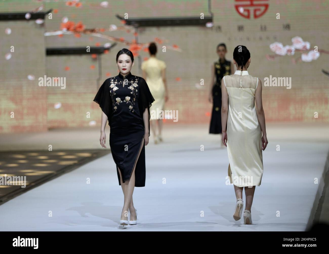Models wearing cheongsam displayed on the catwalk at the Closing ...