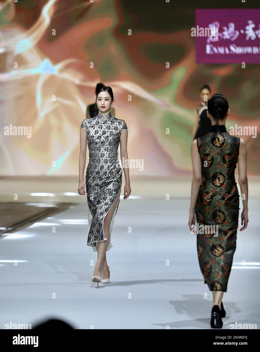 Models wearing cheongsam displayed on the catwalk at the Closing ...