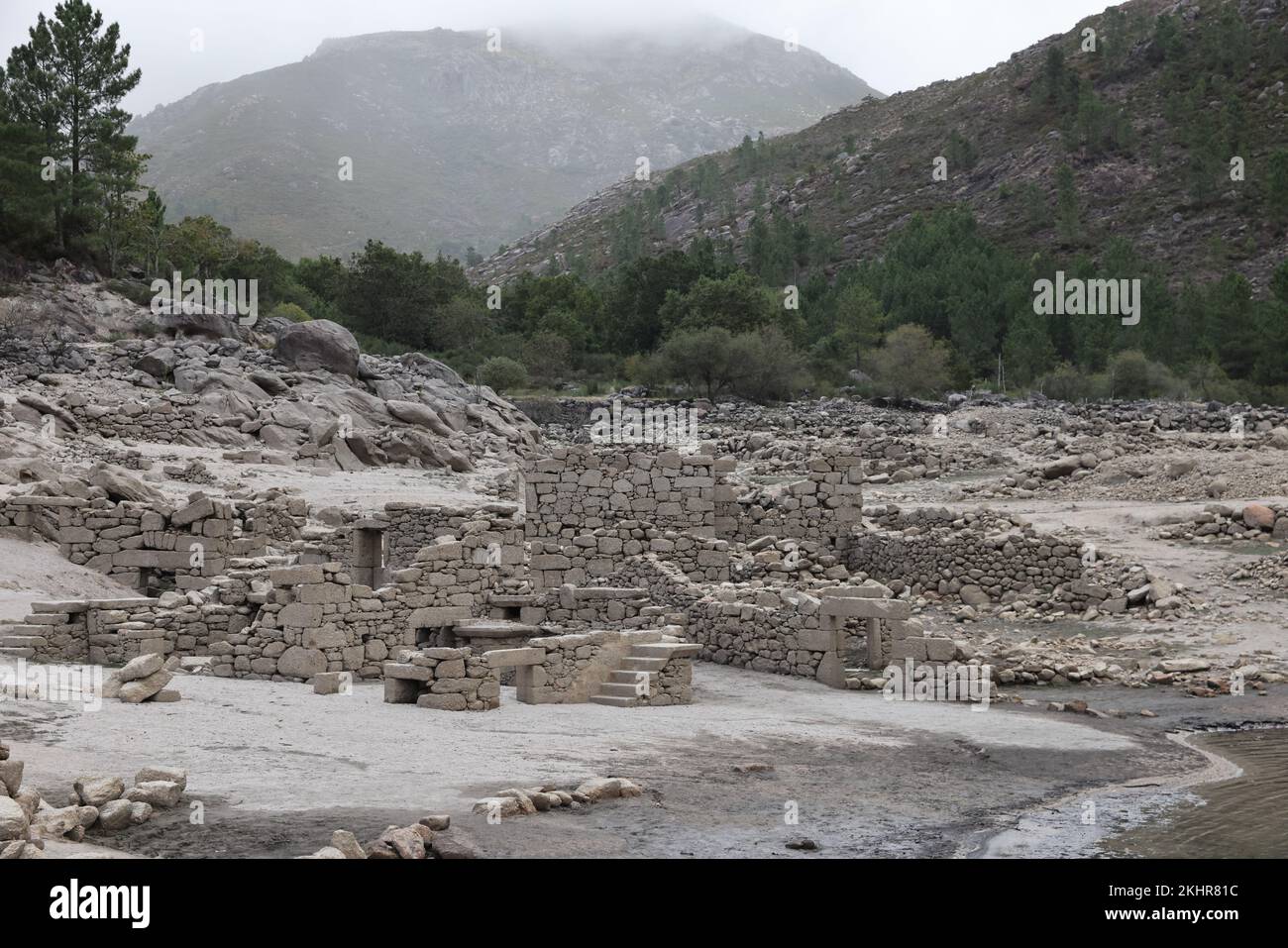 The ruins of Vilarinho da Furna during the dry season, when the former ...