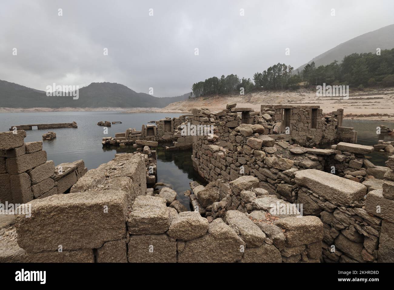 The ruins of Vilarinho da Furna during the dry season, when the former ...