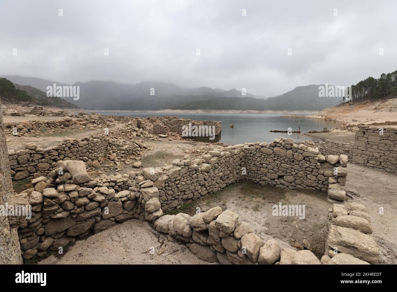 The ruins of Vilarinho da Furna during the dry season, when the former ...