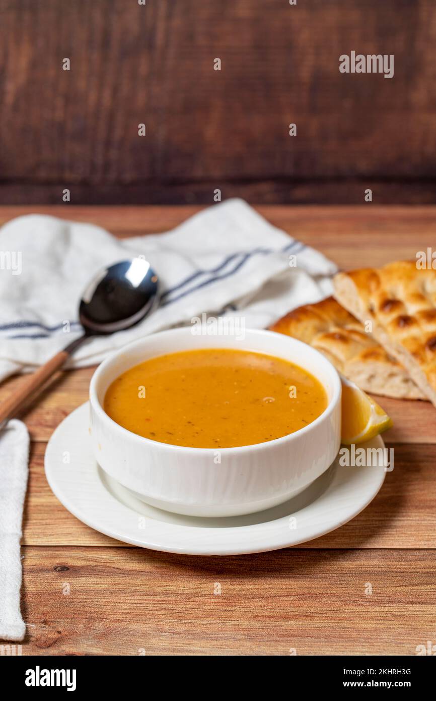 Lentil soup on wood floor. Turkish cuisine delicacies. local name ezo ...