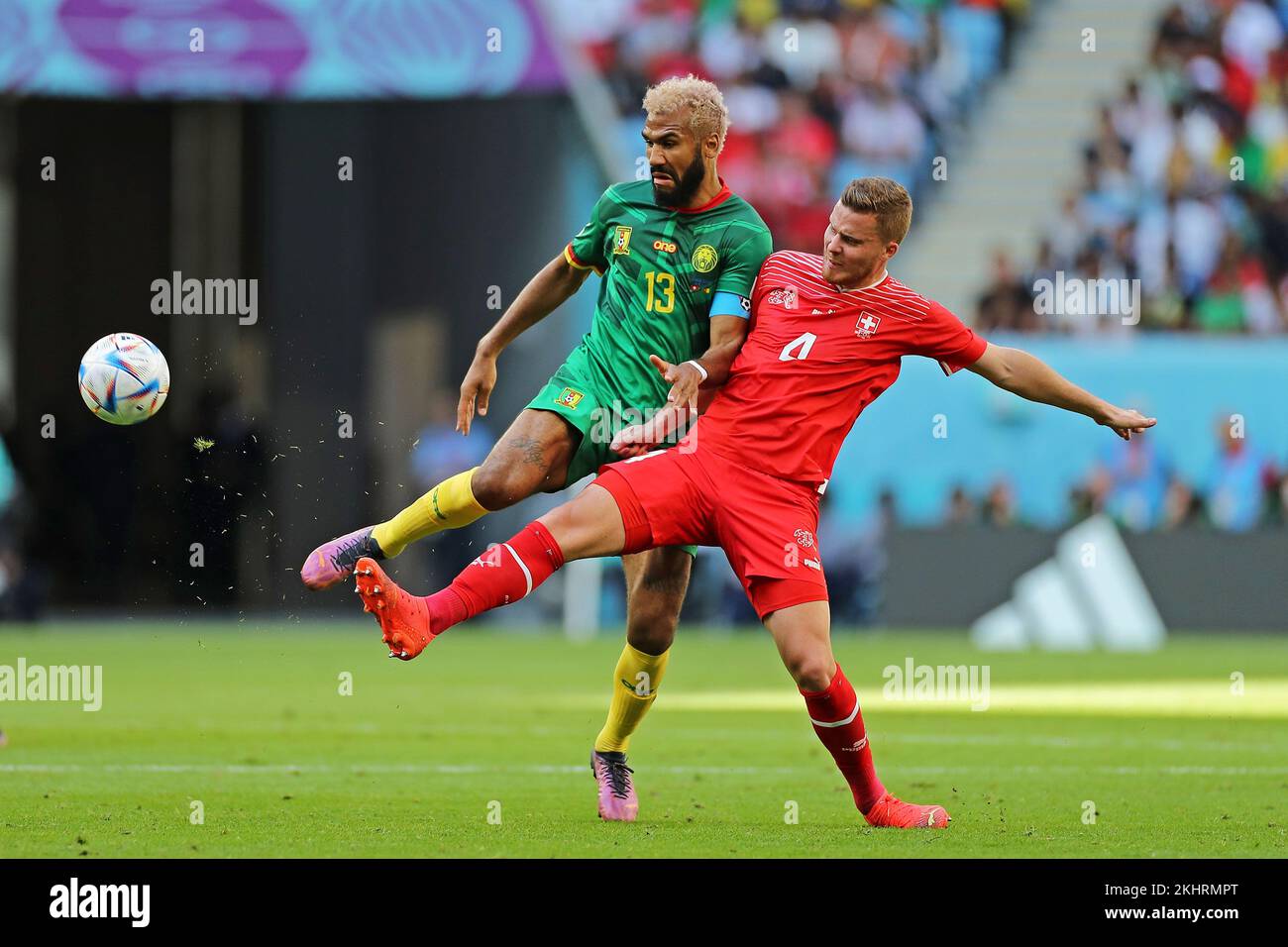 Doha, Qatar. 24th Nov, 2022. Nico Elvedi of Switzerland disputes the ...