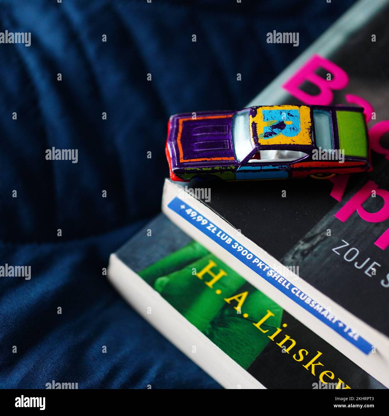 A vertical high-angle view of a Hot Wheels colorful 69 Chevelle toy ...