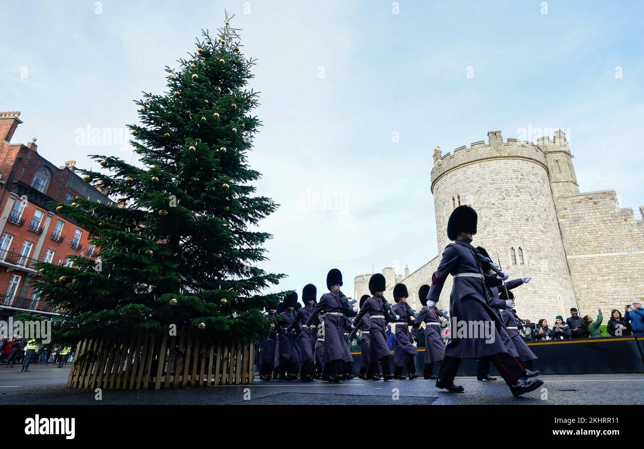 Members of the Nijmegen Company Grenadier Guards make their way past a ...