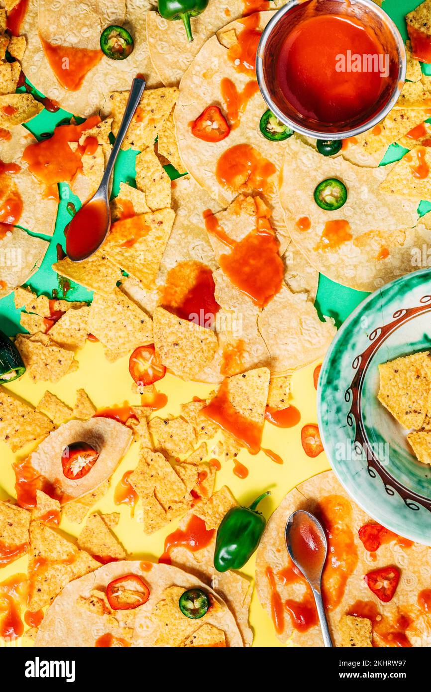 Colorful Tex Mex food with drops and stains of sauce. Top view of ...