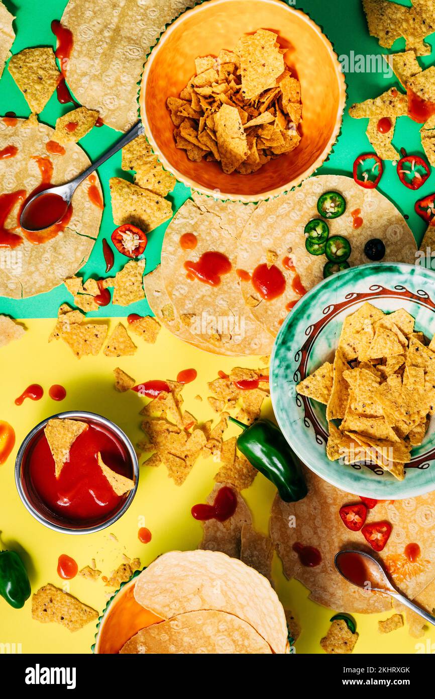 Colorful Tex Mex food with drops and stains of sauce. Top view of ...