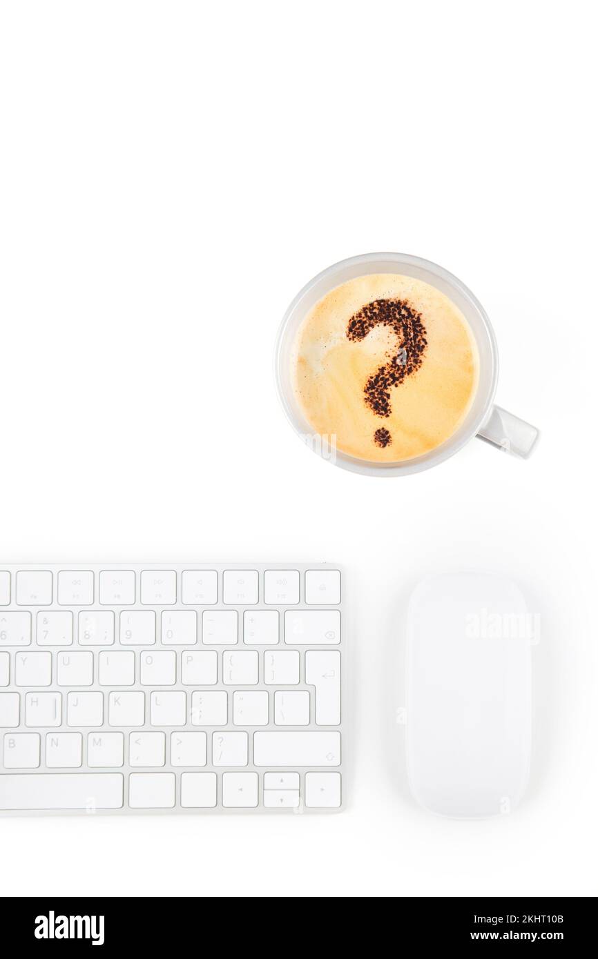 Question mark on cup of coffee on computer desk. Problems Solution ...