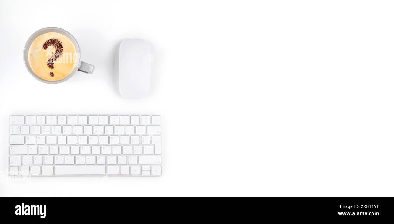 Question mark on cup of coffee on computer desk. Problems Solution ...