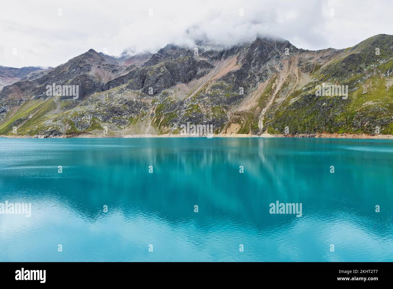 Finstertaler reservoir in Austrian Alps mountains with blue water and ...
