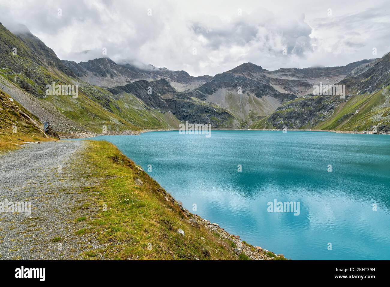 Finstertaler reservoir in Austrian Alps mountains with blue water and ...