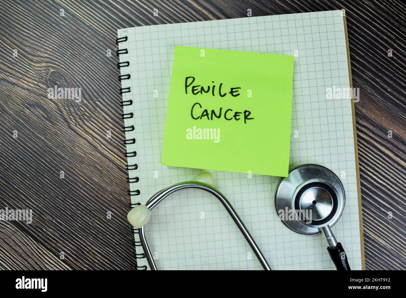 Concept of Penile Cancer write on sticky notes isolated on Wooden Table ...