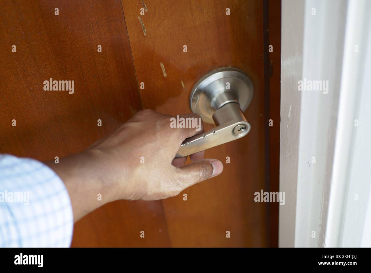Mans hand opening door close hi-res stock photography and images - Alamy