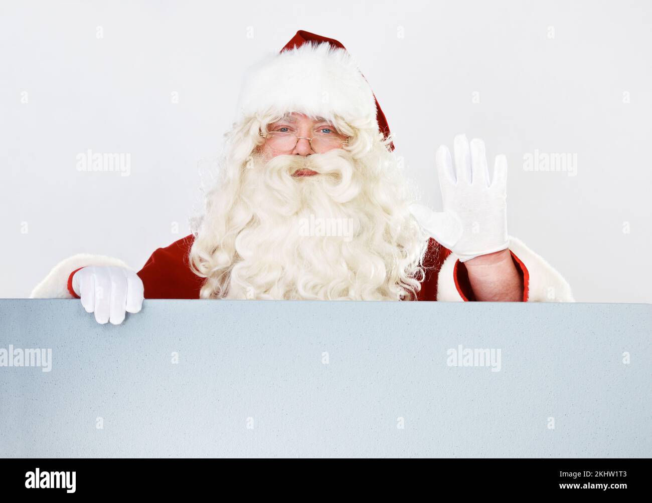 Santa claus waving hand holding hi-res stock photography and images - Alamy