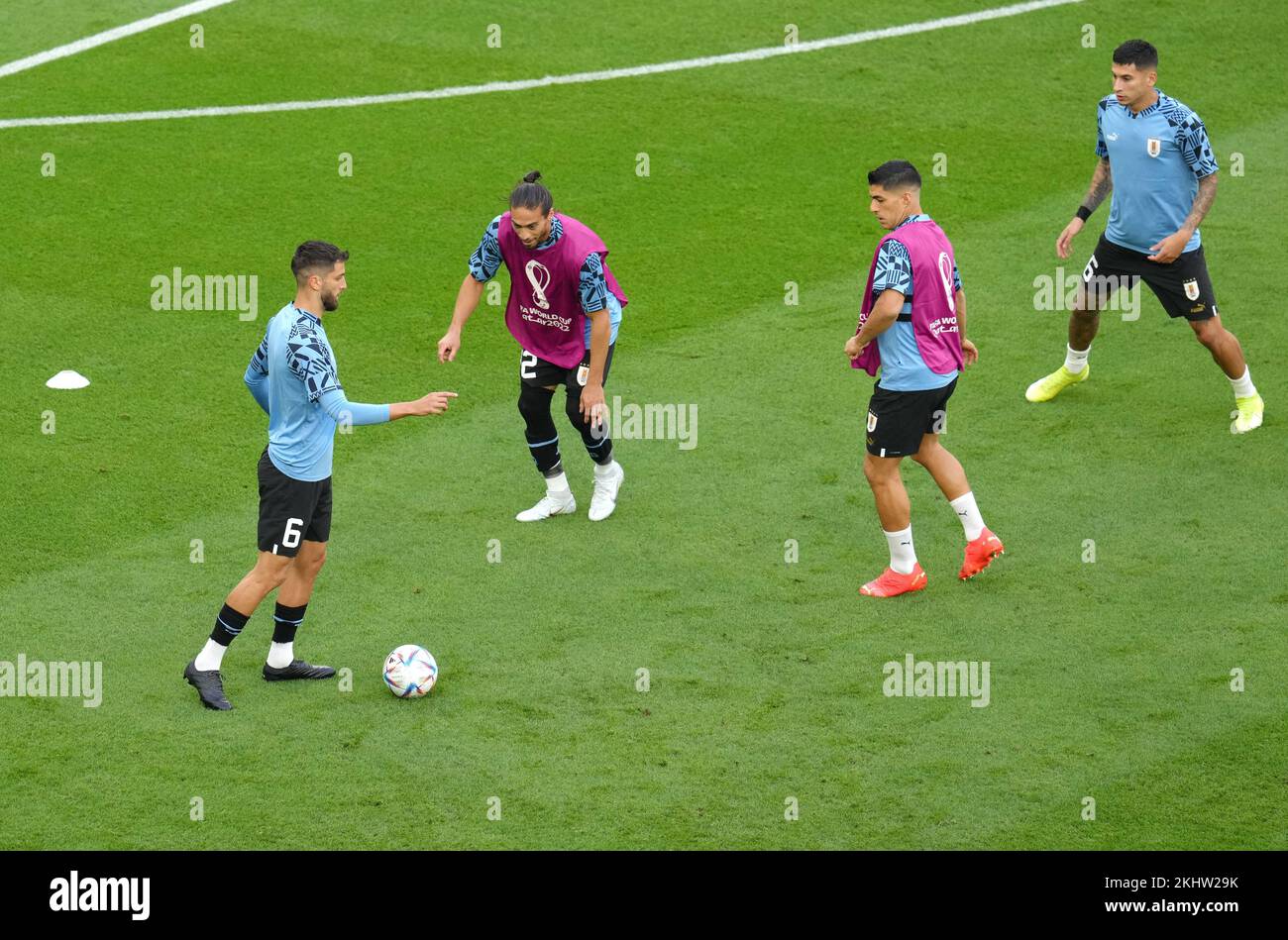 Uruguay's Rodrigo Bentancur (left) and Luis Suarez (second right) warm up prior to the FIFA ...