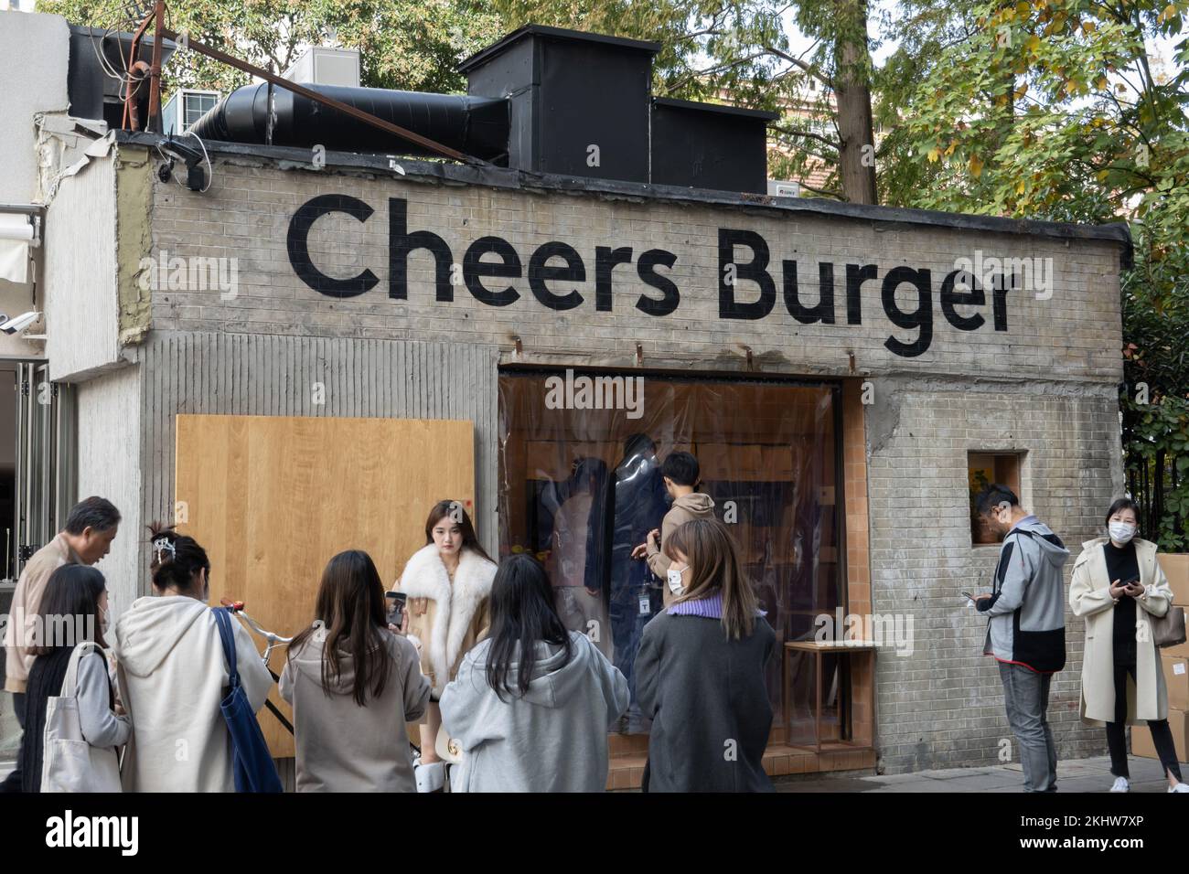SHANGHAI, CHINA - NOVEMBER 24, 2022 - Cheers Burger shoppers gather in ...