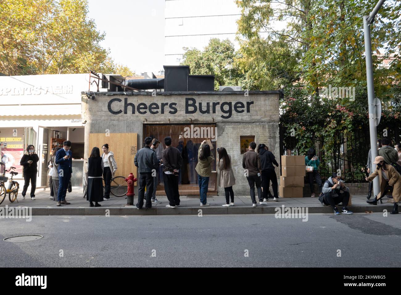 SHANGHAI, CHINA - NOVEMBER 24, 2022 - Cheers Burger shoppers gather in ...