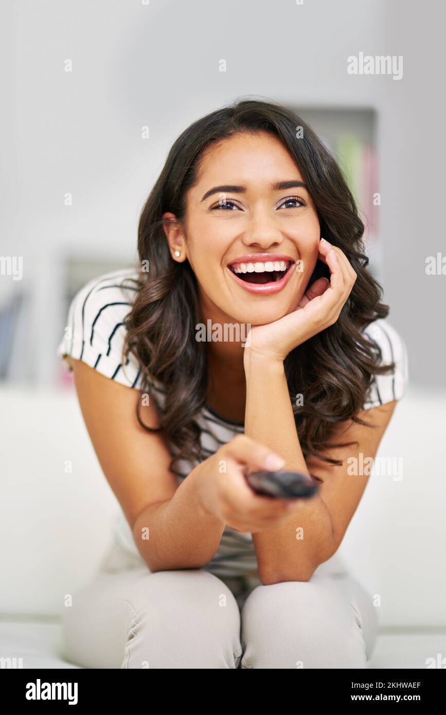 Black woman watching television hi-res stock photography and images - Alamy