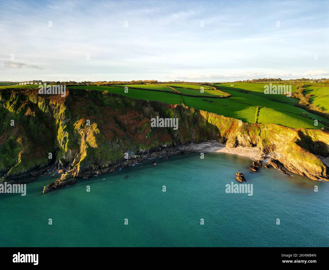 A scenic morning aerial shot of cliffs on the coast of Cornwall, Isles ...