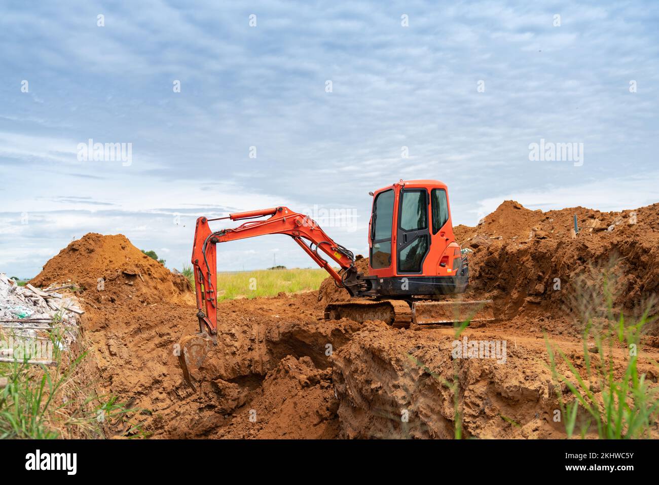 Mini Excavator dug soil back factory for create utility support Stock ...