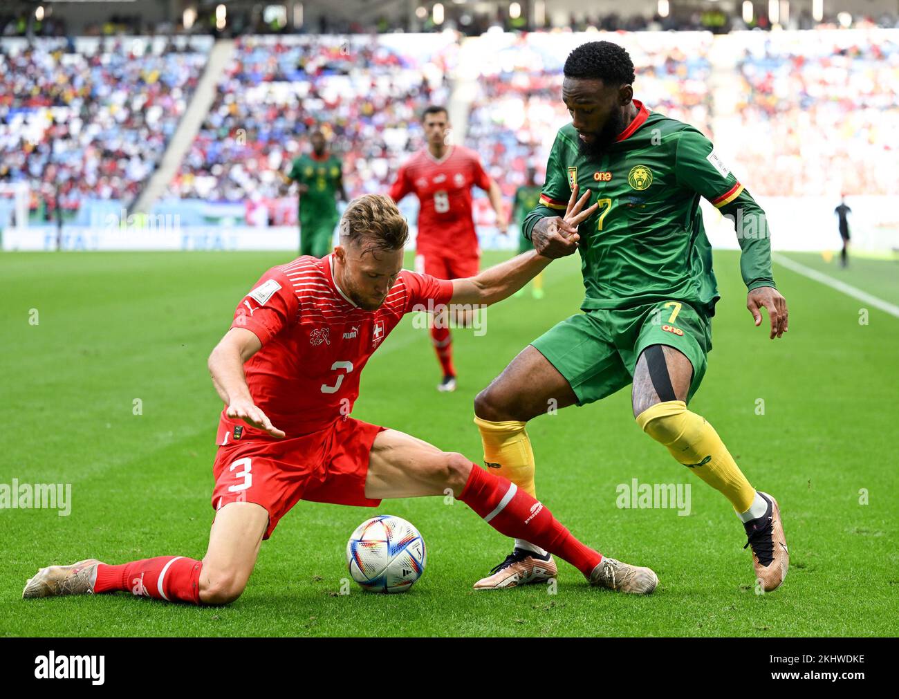 Al Wakrah, Qatar. 24th Nov, 2022. Silvan Widmer (L) of Switzerland vies ...