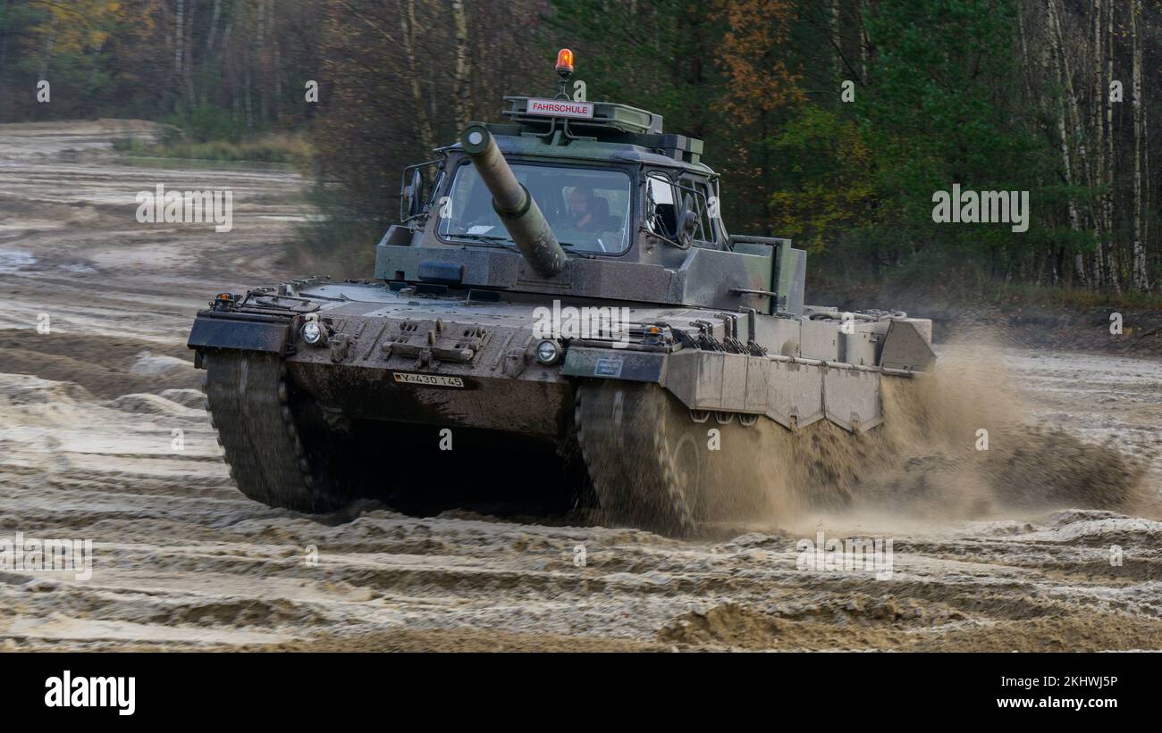 Munster, Germany. 24th Nov, 2022. A Slovakian soldier drives a ...