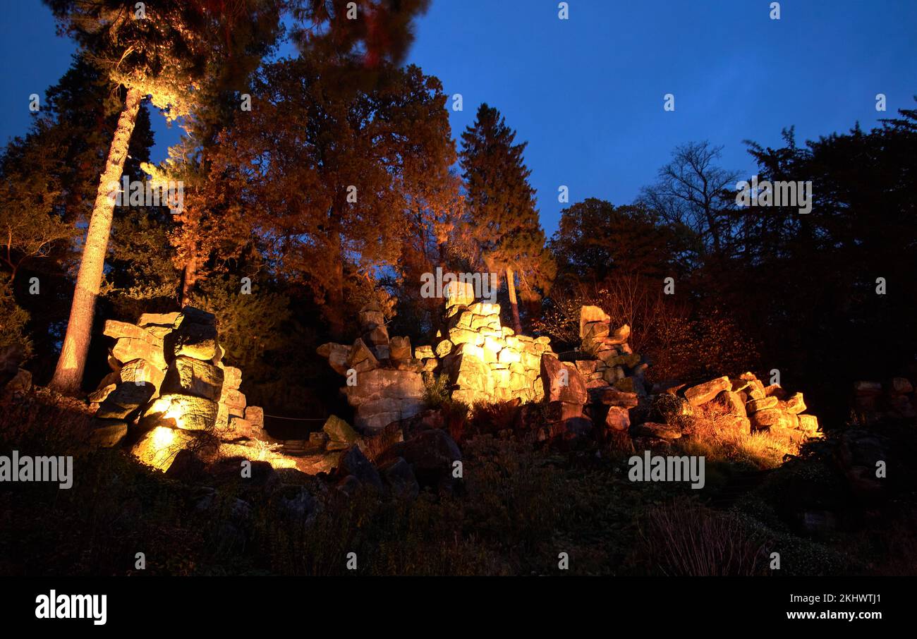 Illuminated rock garden at night Stock Photo - Alamy
