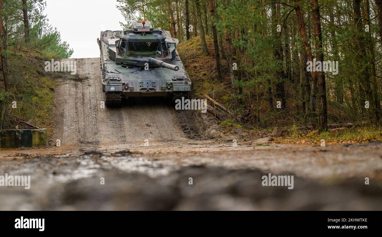 Munster, Germany. 24th Nov, 2022. A Slovakian soldier drives a ...
