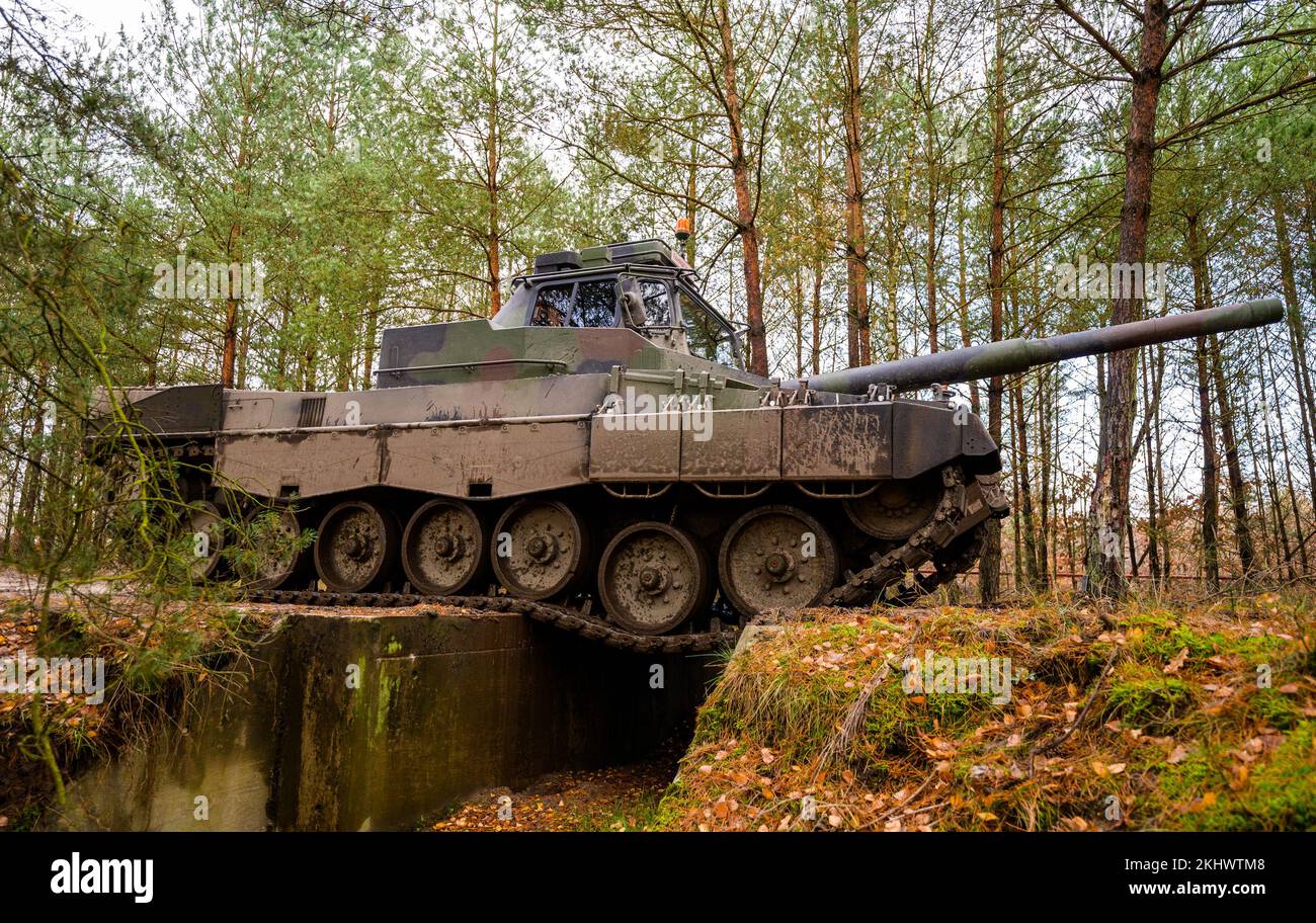 Munster, Germany. 24th Nov, 2022. A Slovakian soldier drives a ...