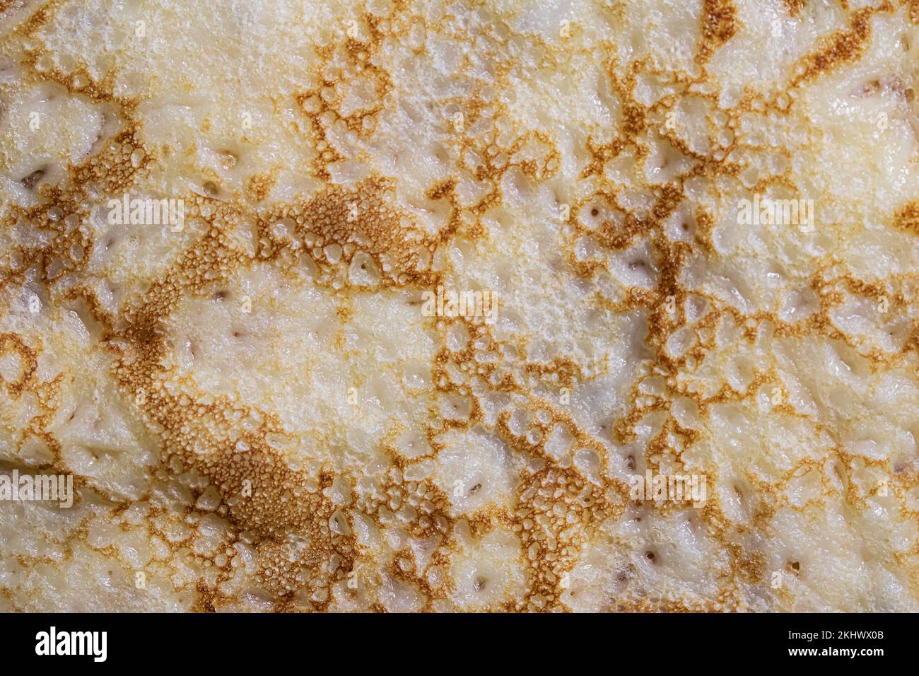 Pancake surface texture and pattern. Close-up of thin hot pancakes in a ...
