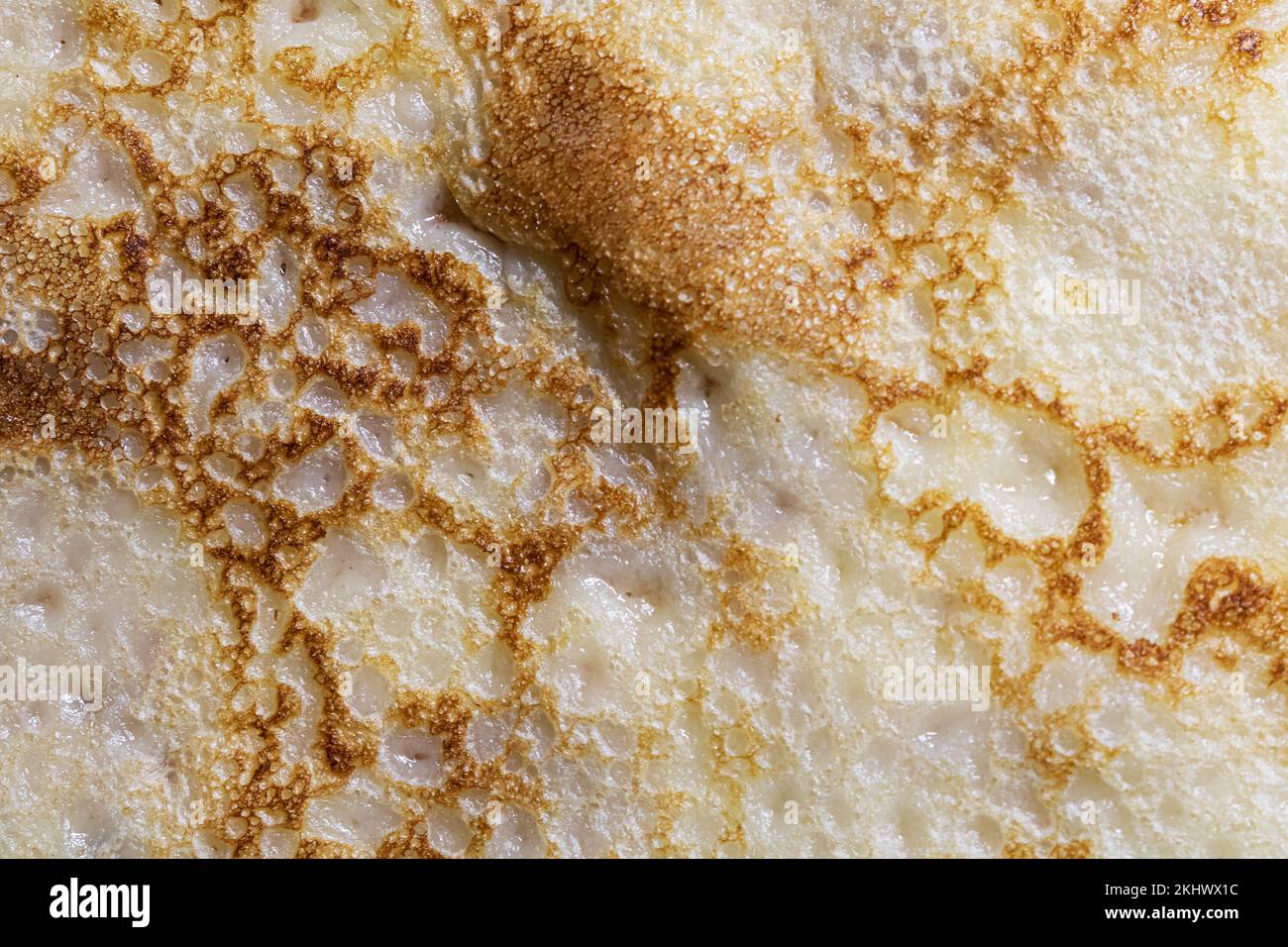 Pancake surface texture and pattern. Close-up of thin hot pancakes in a ...