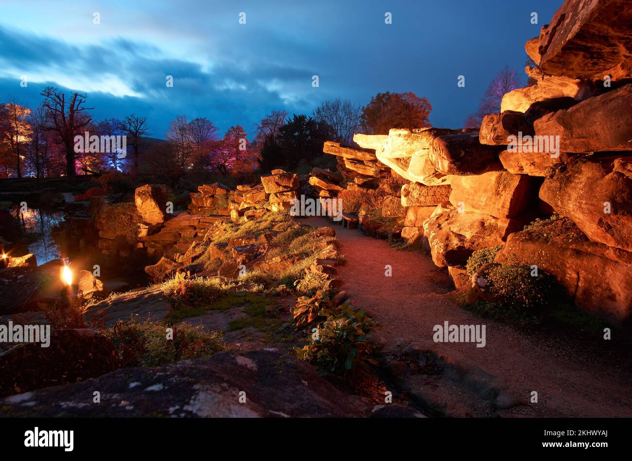 Illuminated rock garden at night Stock Photo - Alamy