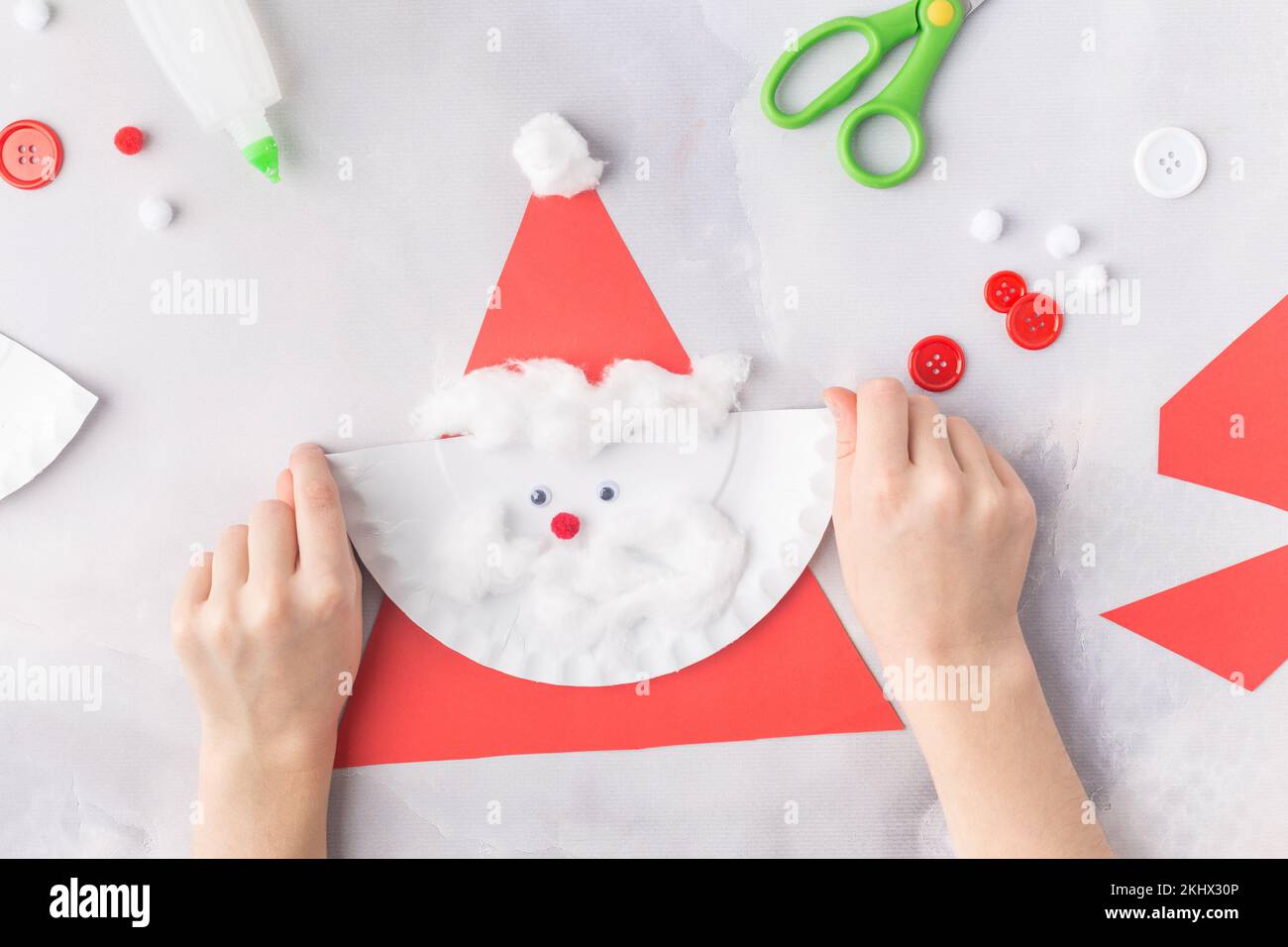 The child makes a greeting card Christmas paper collage. Made with his ...