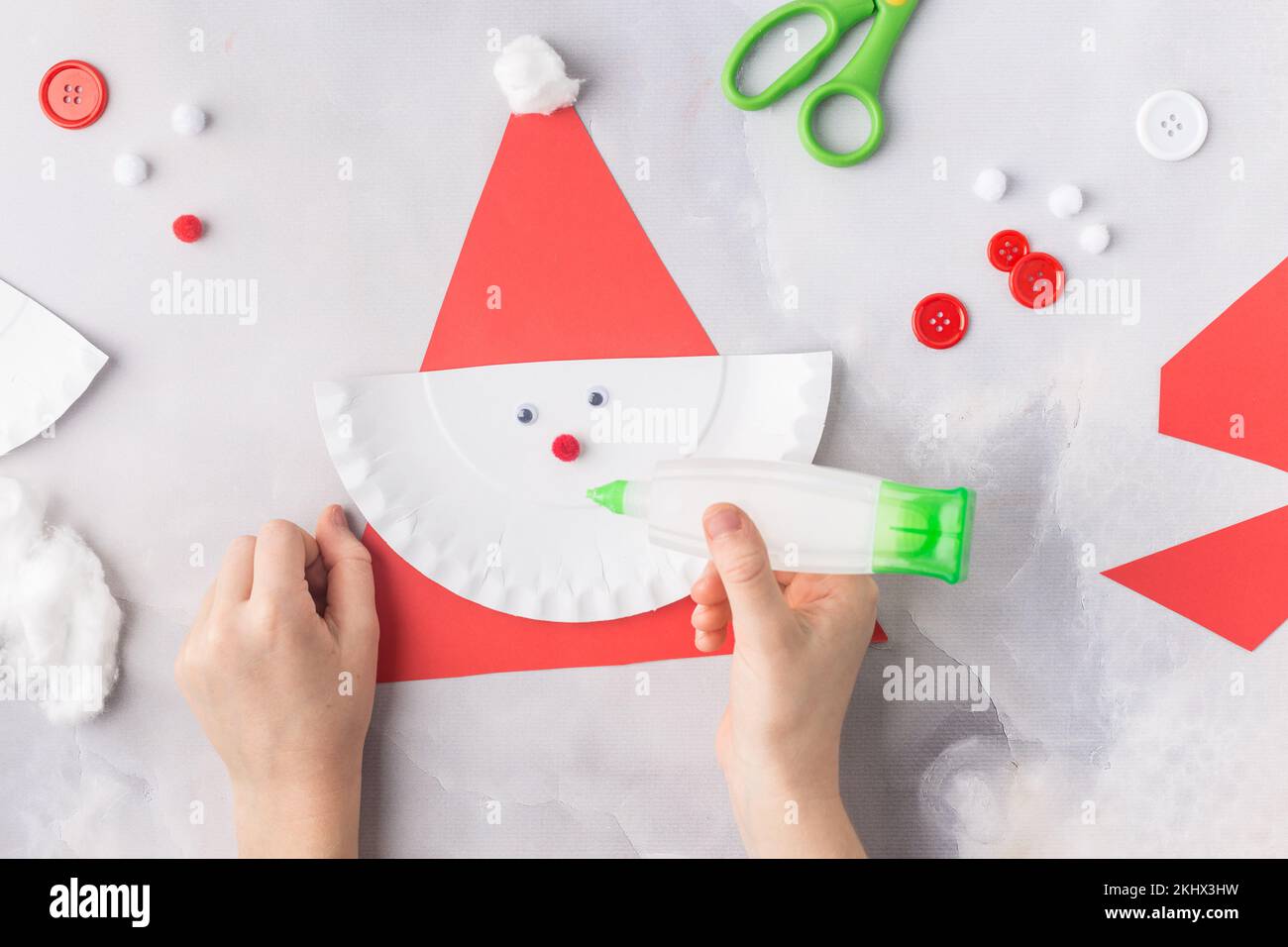 The child makes a greeting card Christmas paper collage. Made with his ...